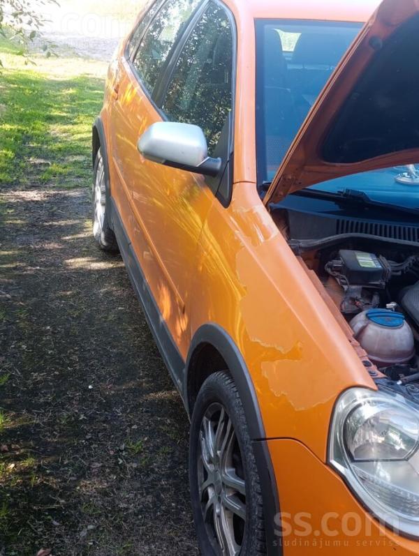 Orange Volkswagen Polo 2006 in Daugavpils, with an engine capacity of 1.90 L and mileage of 379 thousand km for 1700 €, photo 3 on AUTOMOTO.COM.LV