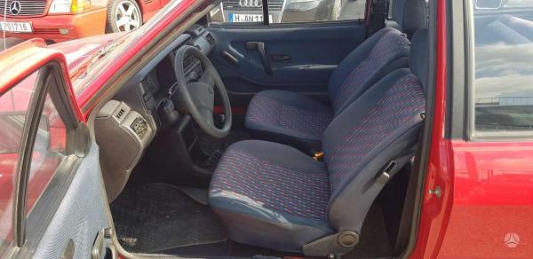 Red Volkswagen Polo 1991 in Marijampole, with an engine capacity of 1.04 L and mileage of 157 thousand km for 1200 €, photo 10 on AUTOMOTO.COM.LV