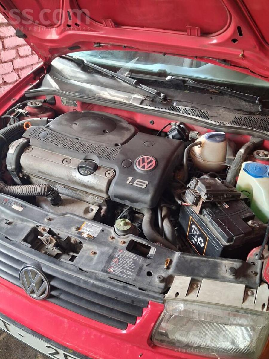 Red Volkswagen Polo 1998 in Liepaja, with an engine capacity of 1.60 L and mileage of 161 thousand km for 1000 €, photo 10 on AUTOMOTO.COM.LV