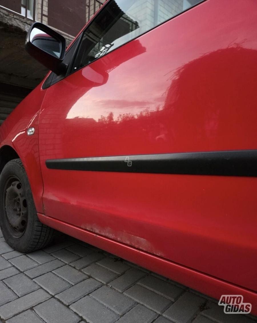 Red Volkswagen Polo 2003 in Kaunas, with an engine capacity of 1.90 L and mileage of 260 thousand km for 650 €, photo 21 on AUTOMOTO.COM.LV