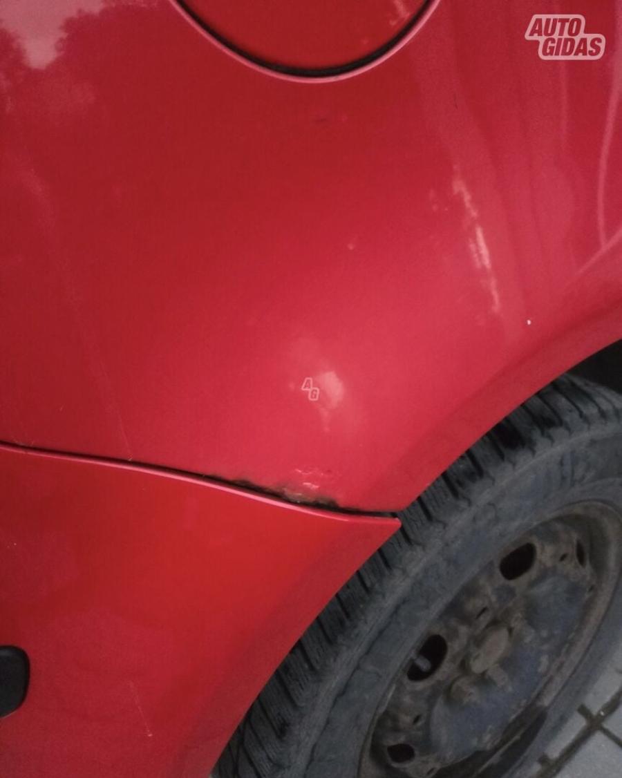 Red Volkswagen Polo 2003 in Kaunas, with an engine capacity of 1.90 L and mileage of 260 thousand km for 650 €, photo 22 on AUTOMOTO.COM.LV