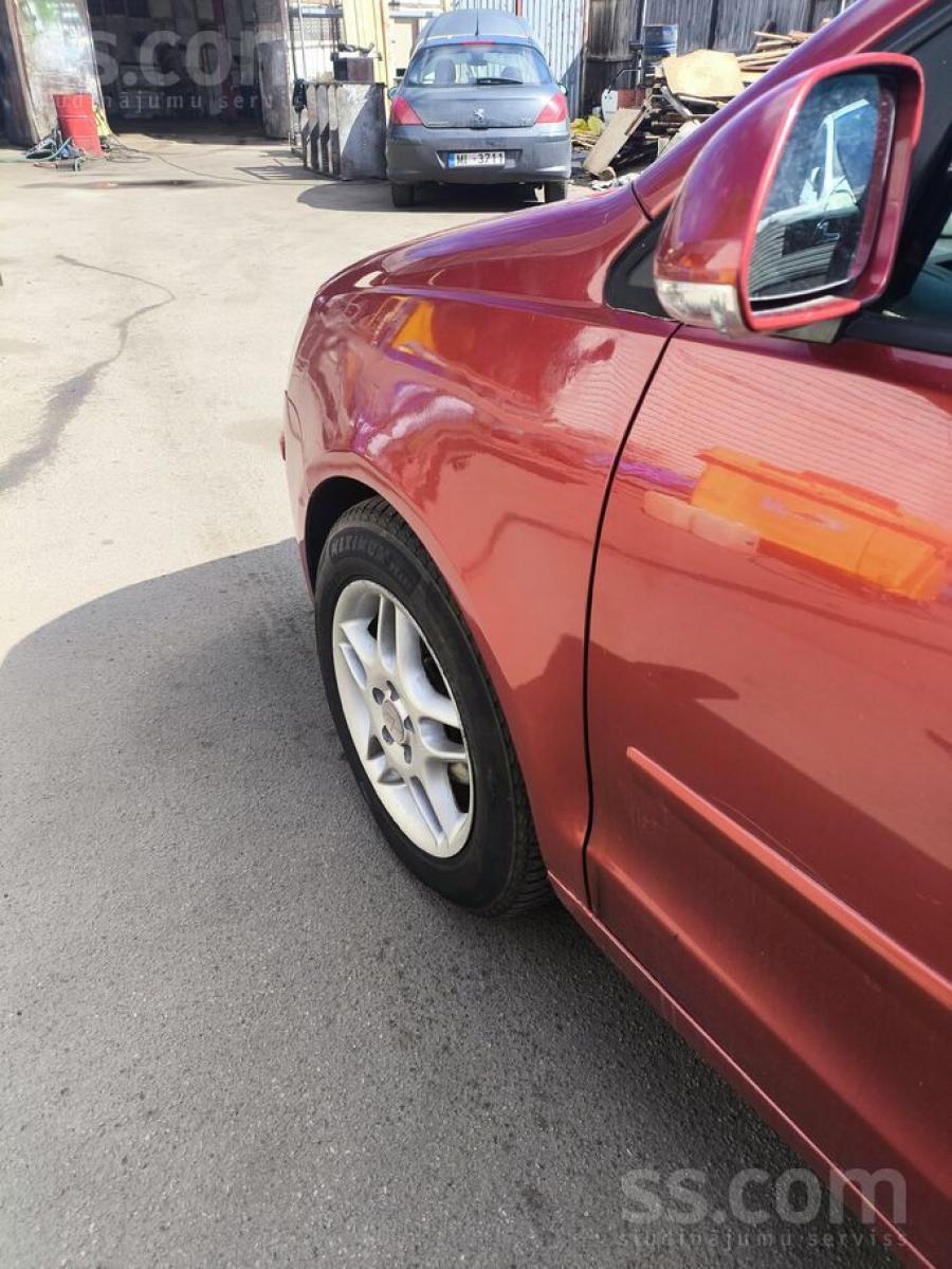 Sarkans Volkswagen Polo 2006 Rīga, ar dzinēja tilpumu 1.40 L un nobraukumu 260 tūkst. km par 1850 €, foto 6 vietnē AUTOMOTO.COM.LV