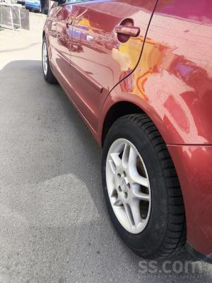 Sarkans Volkswagen Polo 2006 Rīga, ar dzinēja tilpumu 1.40 L un nobraukumu 260 tūkst. km par 1850 €, foto 7 vietnē AUTOMOTO.COM.LV