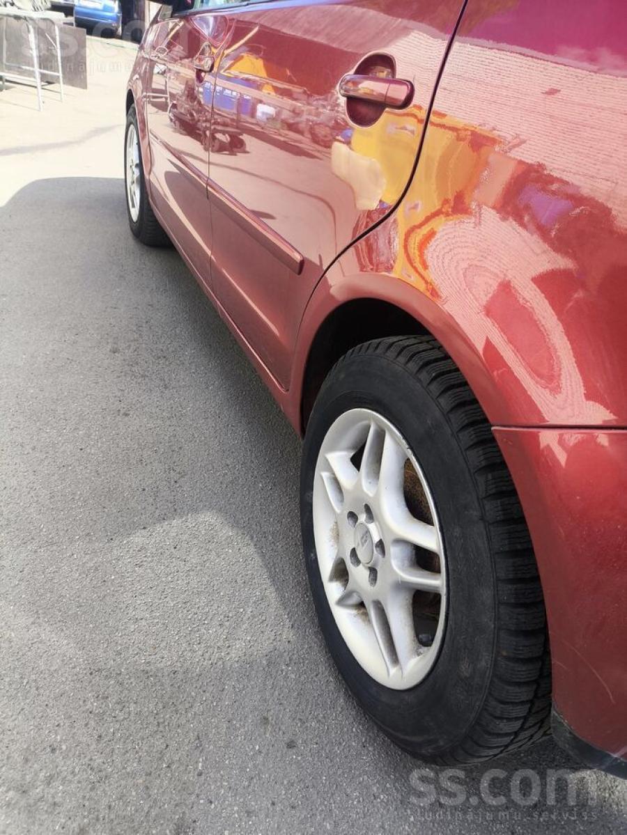 Sarkans Volkswagen Polo 2006 Rīga, ar dzinēja tilpumu 1.40 L un nobraukumu 260 tūkst. km par 1850 €, foto 7 vietnē AUTOMOTO.COM.LV
