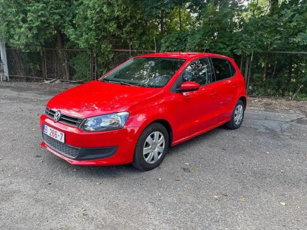 Red Volkswagen Polo 2010 in Ogre, with an engine capacity of 1.40 L and mileage of 232 thousand km for 3990 €, photo 3 on AUTOMOTO.COM.LV