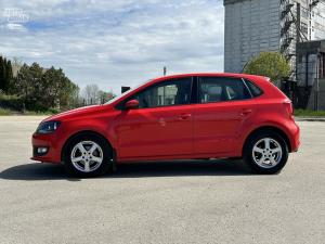 Red Volkswagen Polo 2011 in Plunge, with an engine capacity of 1.20 L and mileage of 198 thousand km for 5850 €, photo 5 on AUTOMOTO.COM.LV