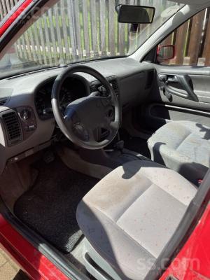 Sarkans Volkswagen Polo 1998 Rīga, ar dzinēja tilpumu 1.80 L un nobraukumu 160 tūkst. km par 900 €, foto 7 vietnē AUTOMOTO.COM.LV