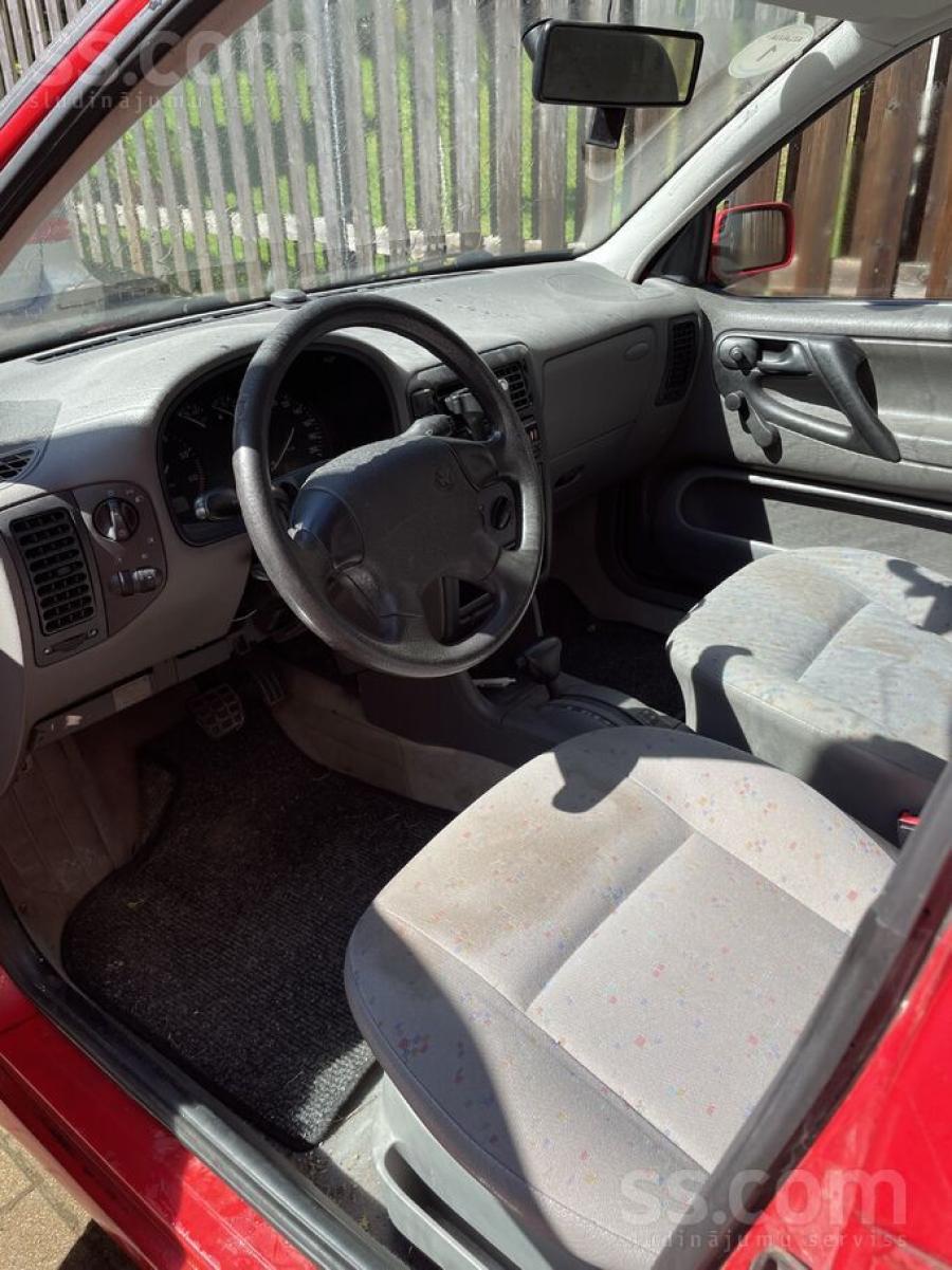 Sarkans Volkswagen Polo 1998 Rīga, ar dzinēja tilpumu 1.80 L un nobraukumu 160 tūkst. km par 900 €, foto 7 vietnē AUTOMOTO.COM.LV