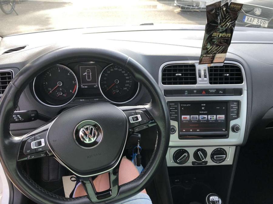 White Volkswagen Polo 2015 in Klaipeda, with an engine capacity of 1.40 L and mileage of 177 thousand km for 4950 €, photo 13 on AUTOMOTO.COM.LV