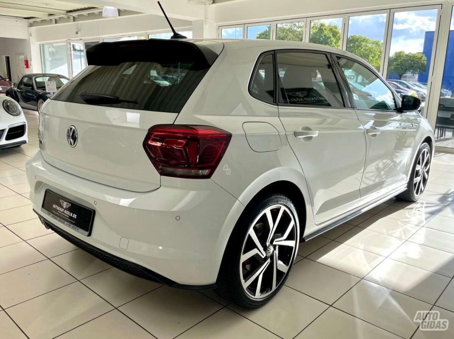 White Volkswagen Polo 2020 in Kaunas, with an engine capacity of 2.00 L and mileage of 47 thousand km for 23832 €, photo 5 on AUTOMOTO.COM.LV