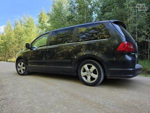 Melns Volkswagen Routan 2010 Panevēža, ar dzinēja tilpumu 3.80 L un nobraukumu 162 tūkst. km par 4999 €, foto 5 vietnē AUTOMOTO.COM.LV