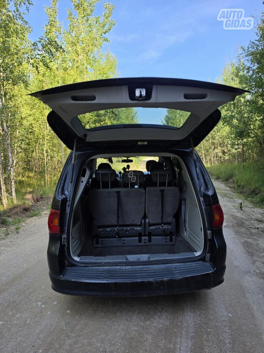 Melns Volkswagen Routan 2010 Panevēža, ar dzinēja tilpumu 3.80 L un nobraukumu 162 tūkst. km par 4999 €, foto 13 vietnē AUTOMOTO.COM.LV