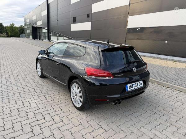 Melns Volkswagen Scirocco 2011 Panevēža, ar dzinēja tilpumu 1.39 L un nobraukumu 185 tūkst. km par 5600 €, foto 5 vietnē AUTOMOTO.COM.LV