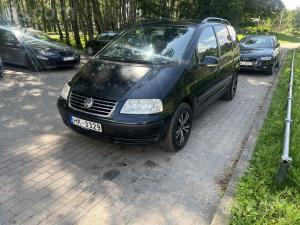 Black Volkswagen Sharan 2004 in Riga, with an engine capacity of 1.90 L and mileage of 260 thousand km for 2300 €, photo 4 on AUTOMOTO.COM.LV