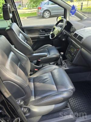 Black Volkswagen Sharan 2007 in Daugavpils, with an engine capacity of 2.00 L and mileage of 245 thousand km for 5400 €, photo 10 on AUTOMOTO.COM.LV
