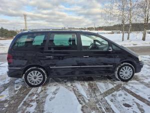 Black Volkswagen Sharan 2010 in Vilnius, with an engine capacity of 1.97 L and mileage of 250 thousand km for 4150 €, photo 6 on AUTOMOTO.COM.LV