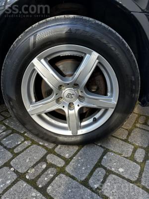 Black Volkswagen Sharan 2010 in Tukums, with an engine capacity of 2.00 L and mileage of 395 thousand km for 3850 €, photo 13 on AUTOMOTO.COM.LV