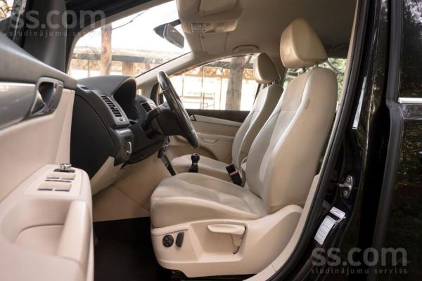 Black Volkswagen Sharan 2011 in Tukums, with an engine capacity of 2.00 L and mileage of 249 thousand km for 6890 €, photo 10 on AUTOMOTO.COM.LV
