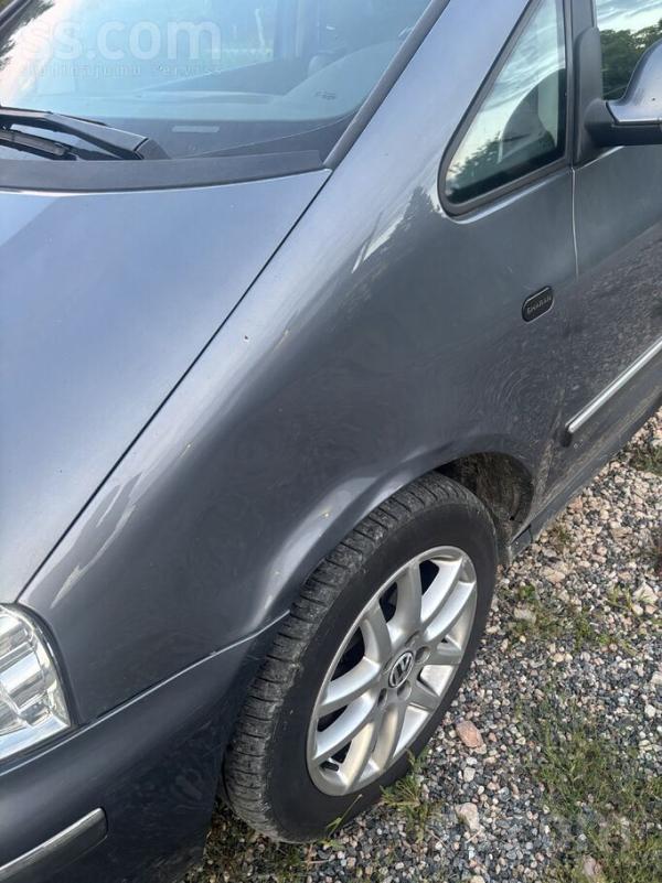 Grey Volkswagen Sharan 2009 in Riga, with an engine capacity of 1.90 L and mileage of 320 thousand km for 3850 €, photo 4 on AUTOMOTO.COM.LV