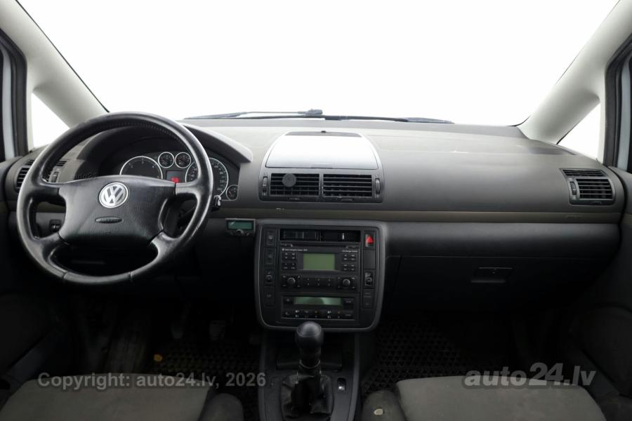 Grey Volkswagen Sharan 2009 in Tallinn, with an engine capacity of 2.00 L and mileage of 294 thousand km for 1199 €, photo 6 on AUTOMOTO.COM.LV