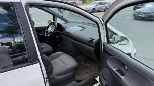 White Volkswagen Sharan 2007 in Vilnius, with an engine capacity of 1.97 L and mileage of 240 thousand km for 2200 €, photo 12 on AUTOMOTO.COM.LV