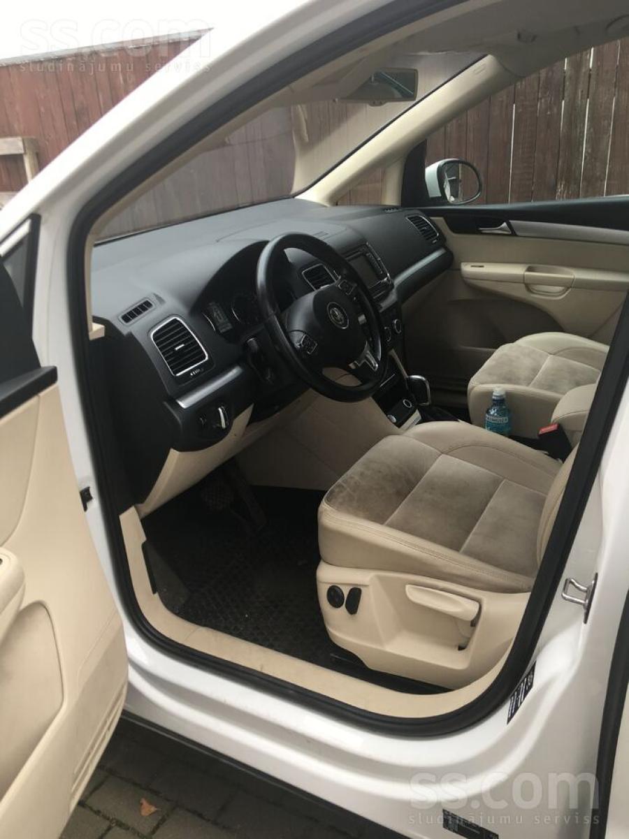 White Volkswagen Sharan 2014 in Riga, with an engine capacity of 2.00 L and mileage of 365 thousand km for 7000 €, photo 3 on AUTOMOTO.COM.LV