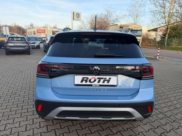 Blue Volkswagen T-Cross 2024 in Kaunas, with an engine capacity of 1.00 L and mileage of 14 thousand km for 28570 €, photo 4 on AUTOMOTO.COM.LV