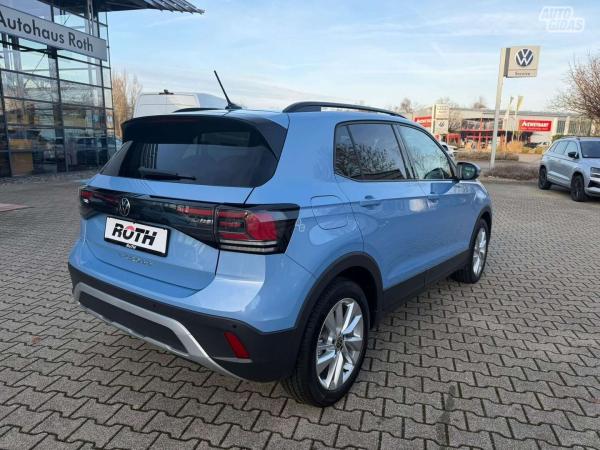Blue Volkswagen T-Cross 2024 in Kaunas, with an engine capacity of 1.00 L and mileage of 14 thousand km for 28570 €, photo 5 on AUTOMOTO.COM.LV