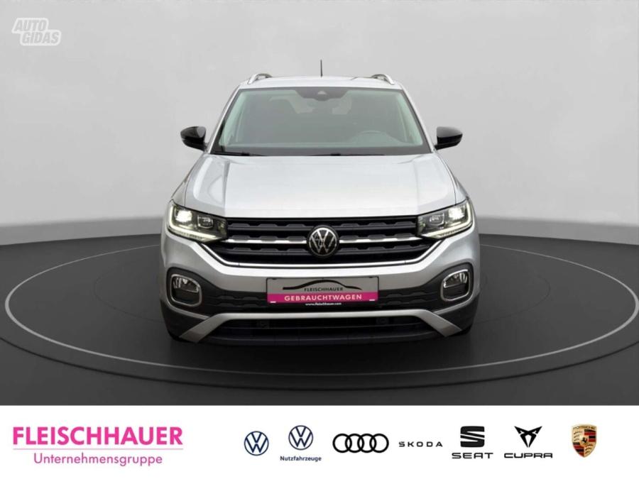Grey Volkswagen T-Cross 2023 in Kaunas, with an engine capacity of 1.50 L and mileage of 23 thousand km for 26510 €, photo 2 on AUTOMOTO.COM.LV