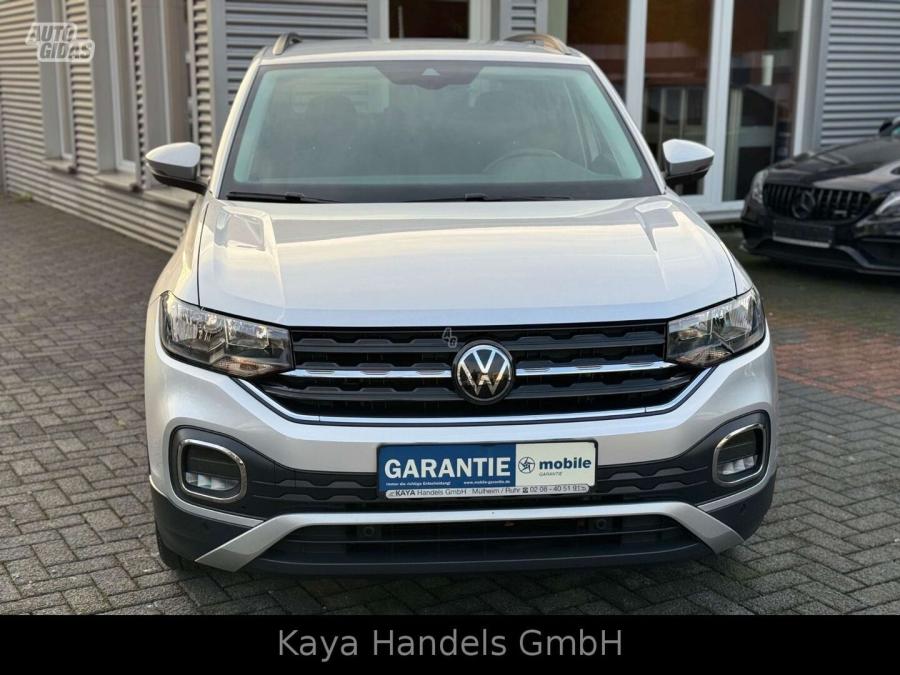 Grey Volkswagen T-Cross 2023 in Kaunas, with an engine capacity of 1.00 L and mileage of 32 thousand km for 21594 €, photo 4 on AUTOMOTO.COM.LV