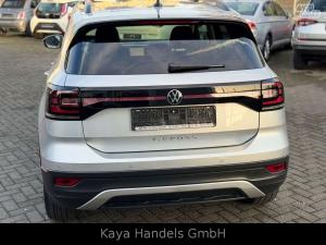 Grey Volkswagen T-Cross 2023 in Kaunas, with an engine capacity of 1.00 L and mileage of 32 thousand km for 21594 €, photo 5 on AUTOMOTO.COM.LV