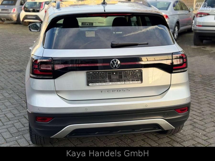 Grey Volkswagen T-Cross 2023 in Kaunas, with an engine capacity of 1.00 L and mileage of 32 thousand km for 21594 €, photo 5 on AUTOMOTO.COM.LV