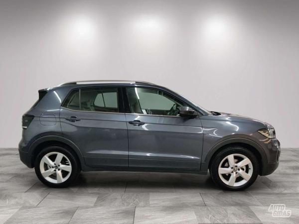 Grey Volkswagen T-Cross 2023 in Kaunas, with an engine capacity of 1.00 L and mileage of 19 thousand km for 22097 €, photo 6 on AUTOMOTO.COM.LV