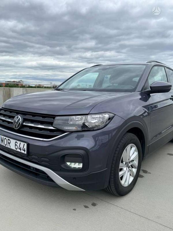 Grey Volkswagen T-Cross 2023 in Vilnius, with an engine capacity of 1.00 L and mileage of 95 thousand km for 14000 €, photo 1 on AUTOMOTO.COM.LV