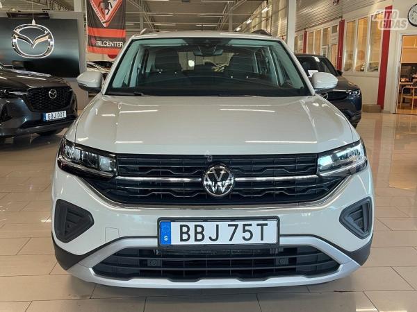 Grey Volkswagen T-Cross 2024 in Kaunas, with an engine capacity of 0.00 L and mileage of 32 thousand km for 25189 €, photo 2 on AUTOMOTO.COM.LV