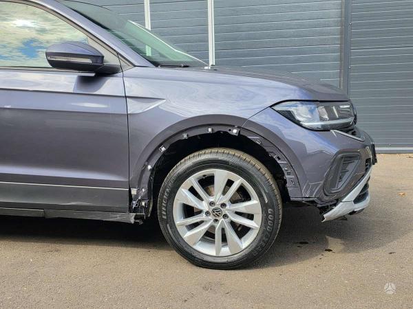 Grey Volkswagen T-Cross 2025 in Kaunas, with an engine capacity of 1.00 L and mileage of 28 thousand km for 14400 €, photo 10 on AUTOMOTO.COM.LV