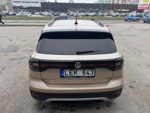Orange Volkswagen T-Cross 2019 in Kaunas, with an engine capacity of 1.00 L and mileage of 50 thousand km for 15999 €, photo 4 on AUTOMOTO.COM.LV