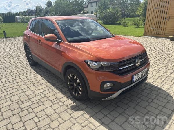 Orange Volkswagen T-Cross 2019 in Valmiera, with an engine capacity of 1.00 L and mileage of 63 thousand km for 15500 €, photo 1 on AUTOMOTO.COM.LV