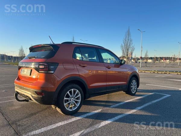 Orange Volkswagen T-Cross 2020 in Riga, with an engine capacity of 1.00 L and mileage of 26 thousand km for 16290 €, photo 2 on AUTOMOTO.COM.LV