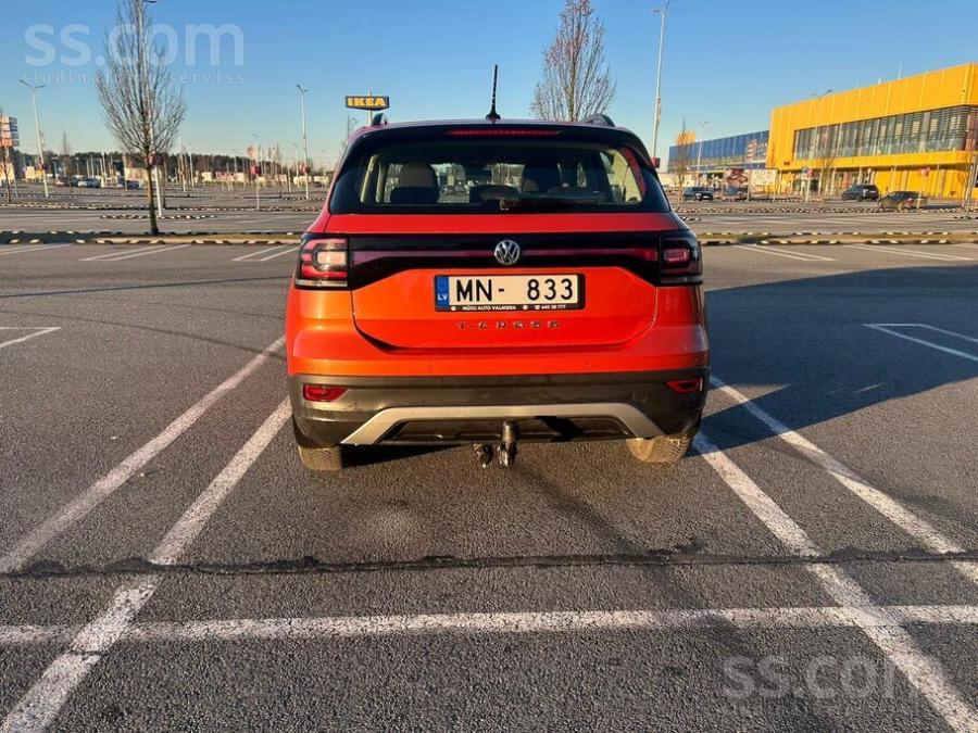 Orange Volkswagen T-Cross 2020 in Riga, with an engine capacity of 1.00 L and mileage of 26 thousand km for 16290 €, photo 4 on AUTOMOTO.COM.LV