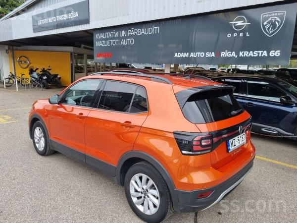Orange Volkswagen T-Cross 2021 in Riga, with an engine capacity of 1.00 L and mileage of 89 thousand km for 14200 €, photo 5 on AUTOMOTO.COM.LV