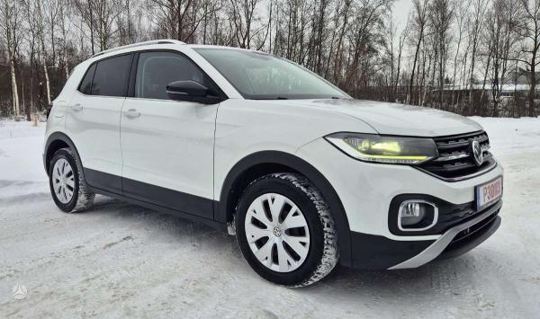 White Volkswagen T-Cross 2019 in Utena, with an engine capacity of 1.60 L and mileage of 240 thousand km for 10750 €, photo 6 on AUTOMOTO.COM.LV