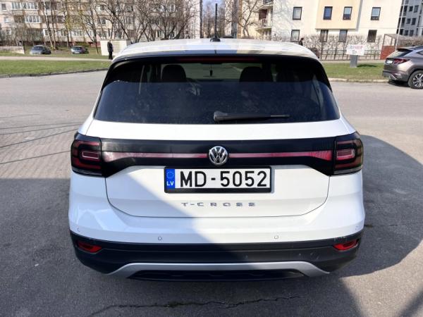 White Volkswagen T-Cross 2019 in Riga, with an engine capacity of 1.00 L and mileage of 244 thousand km for 13550 €, photo 7 on AUTOMOTO.COM.LV