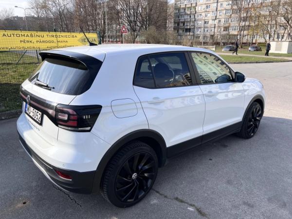 White Volkswagen T-Cross 2019 in Riga, with an engine capacity of 1.00 L and mileage of 244 thousand km for 13550 €, photo 6 on AUTOMOTO.COM.LV