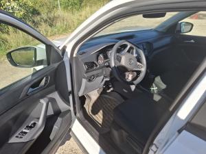 White Volkswagen T-Cross 2021 in Vilnius, with an engine capacity of 1.00 L and mileage of 260 thousand km for 13200 €, photo 4 on AUTOMOTO.COM.LV