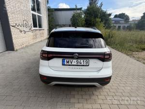 White Volkswagen T-Cross 2021 in Riga, with an engine capacity of 1.00 L and mileage of 163 thousand km for 11990 €, photo 7 on AUTOMOTO.COM.LV