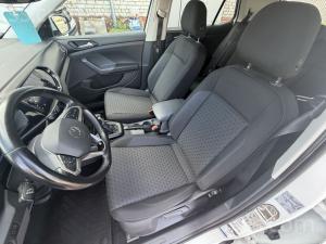 White Volkswagen T-Cross 2021 in Riga, with an engine capacity of 1.00 L and mileage of 163 thousand km for 11990 €, photo 11 on AUTOMOTO.COM.LV