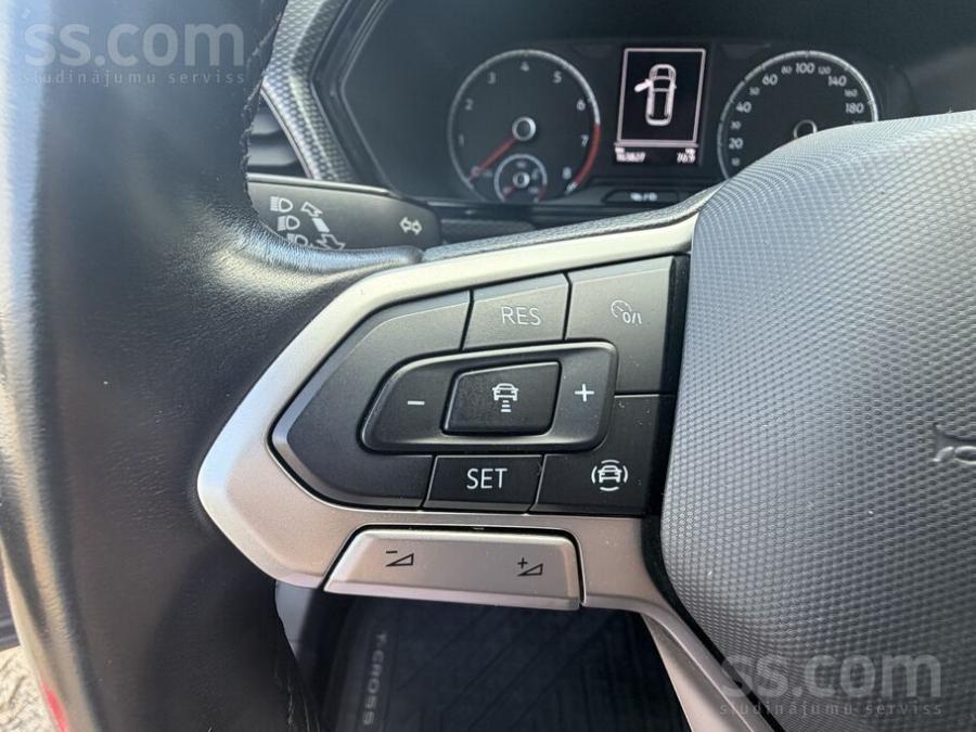 White Volkswagen T-Cross 2021 in Riga, with an engine capacity of 1.00 L and mileage of 163 thousand km for 11990 €, photo 16 on AUTOMOTO.COM.LV