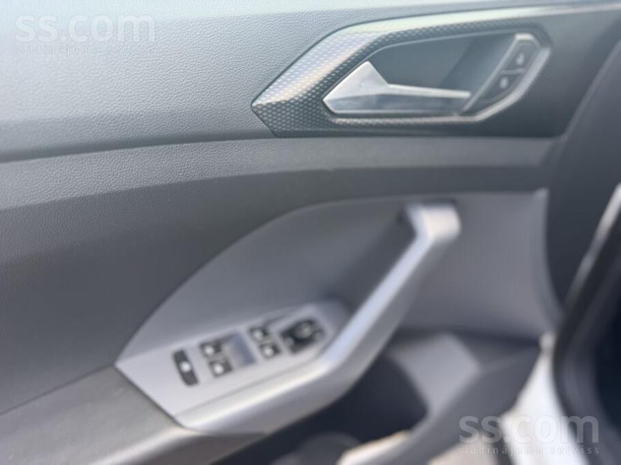 White Volkswagen T-Cross 2021 in Riga, with an engine capacity of 1.00 L and mileage of 163 thousand km for 11990 €, photo 20 on AUTOMOTO.COM.LV