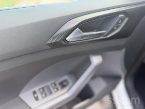 White Volkswagen T-Cross 2021 in Riga, with an engine capacity of 1.00 L and mileage of 163 thousand km for 11990 €, photo 21 on AUTOMOTO.COM.LV